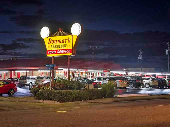 That glowing sign isn't just advertising; it's a beacon calling you home to simpler, more delicious times.