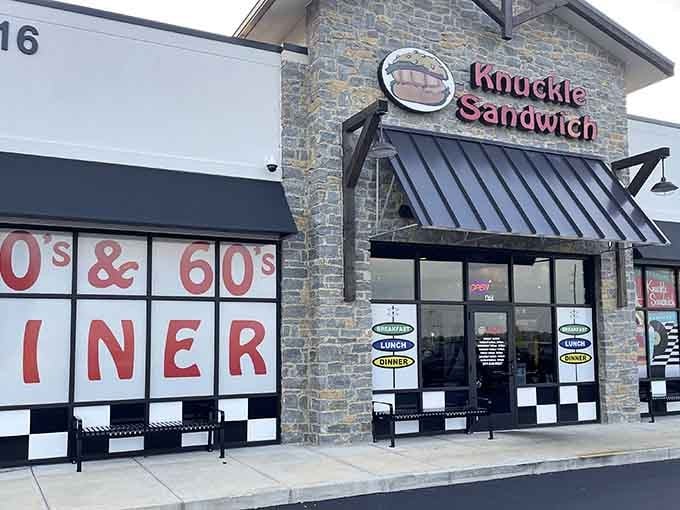 Bold red letters spelling "50's & 60's DINER" promise a trip down memory lane with every meal.