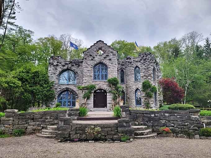 The exterior's weathered stone and dramatic archways look like they belong in a storybook, not Little Falls.