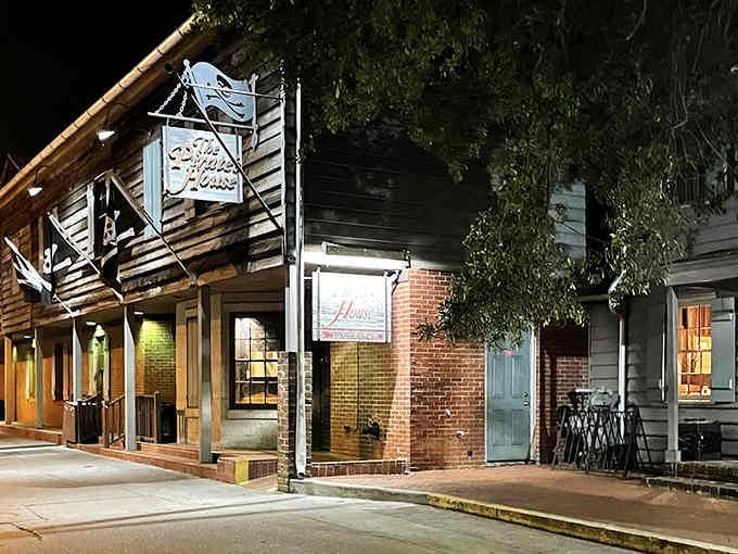After dark, the brick and timber exterior transforms into something from a Stevenson novel, atmospheric and utterly inviting.