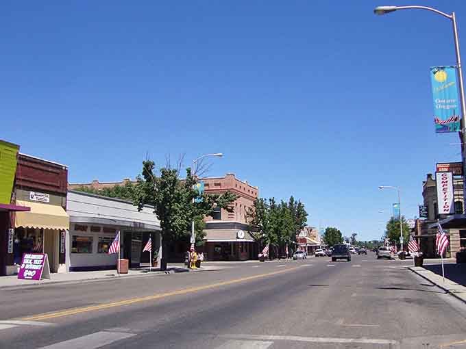 Main Street stretches wide and welcoming under endless blue skies, proving small-town charm never goes out of style.