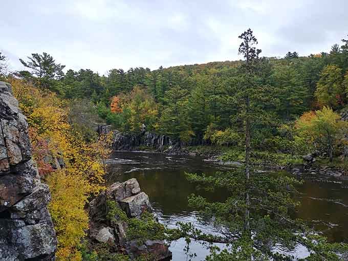 Fall's gentle palette softens the rugged landscape, proving even billion-year-old rocks appreciate a seasonal wardrobe change.