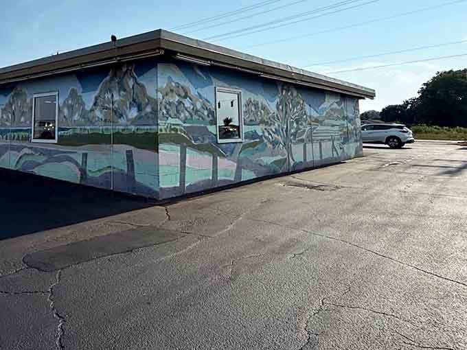That mural isn't just decoration, it's a promise that something special awaits inside this Madison barbecue sanctuary.