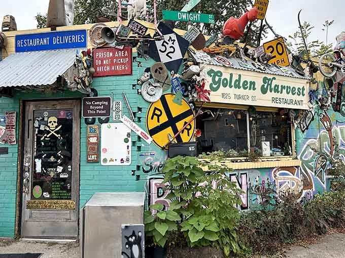 Road signs, vintage finds, and pure creativity cover every surface, making this the most photographed breakfast spot around.