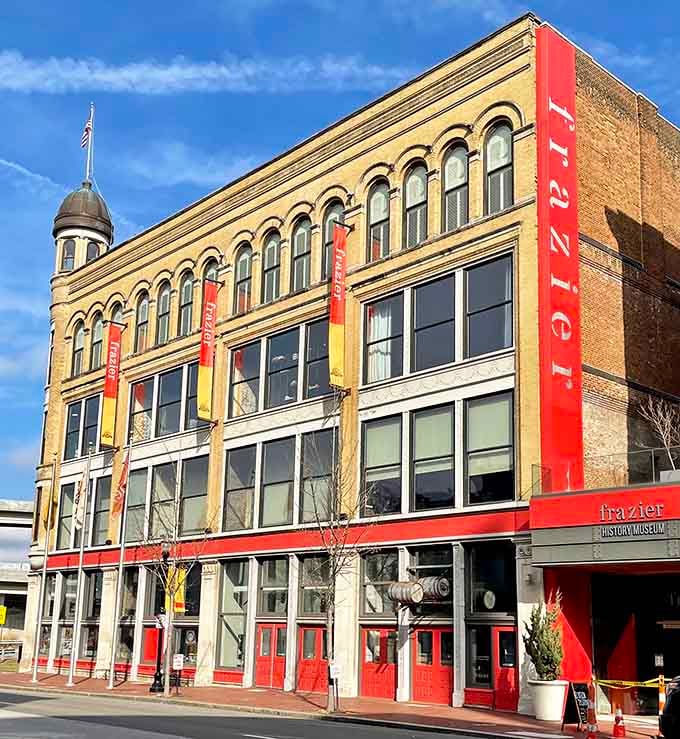 That bold red signage against classic architecture proves history doesn't have to look boring or stuffy.