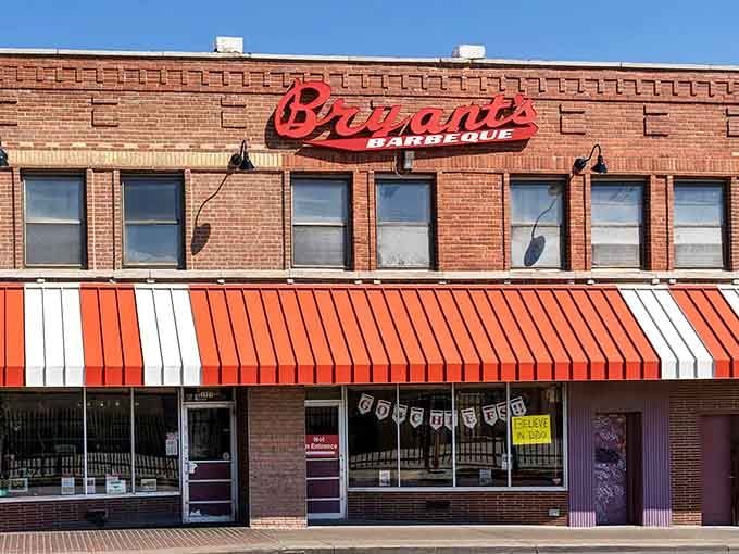 That striped awning and neon sign aren't trying to impress anyone &ndash; they're just marking barbecue greatness.