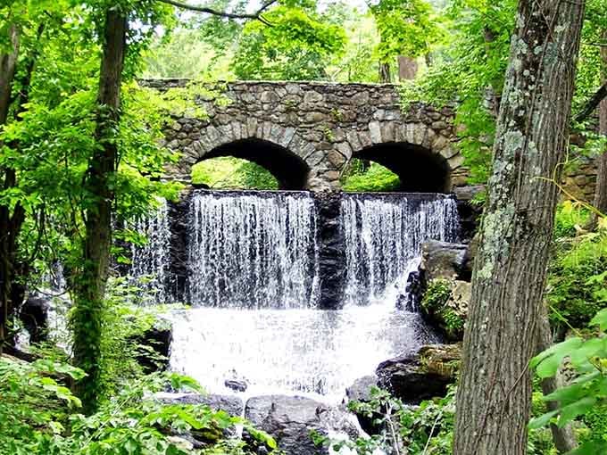 When spring arrives, this double-arched beauty becomes a thundering curtain of water framed by emerald leaves.