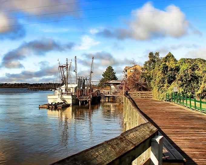That boardwalk and those shrimp boats aren't just pretty scenery, they're your gateway to coastal Georgia magic.