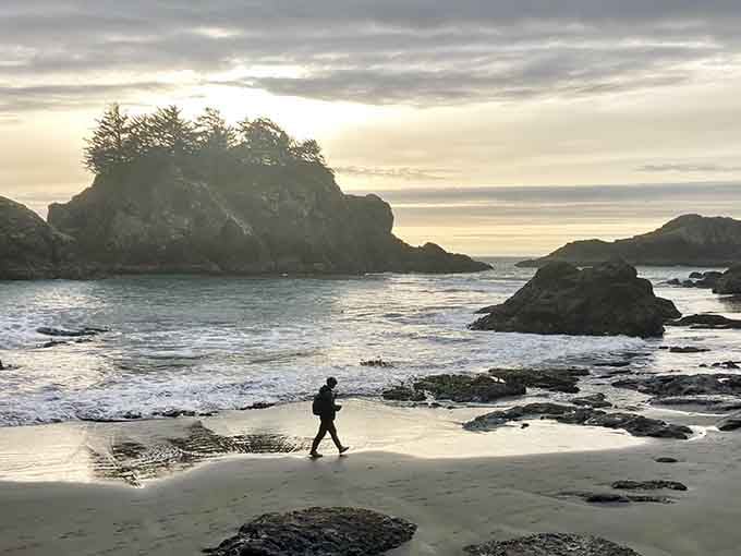 That solitary figure on the sand perfectly captures the peaceful solitude that makes Secret Beach so special.