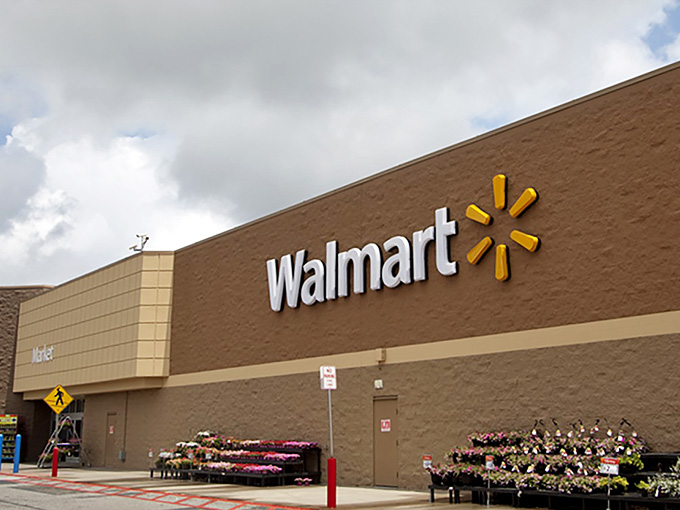 The iconic yellow spark logo beckons shoppers to discover what makes this Albany location truly special.