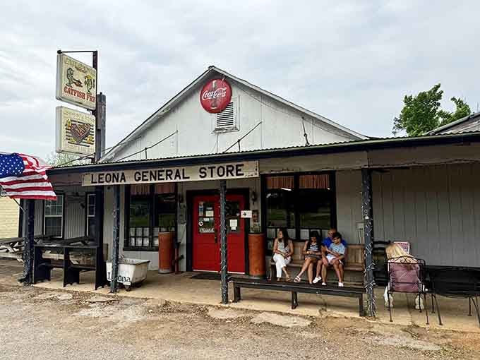 That vintage Coca-Cola sign isn't just decoration—it's a beacon guiding hungry travelers to steak paradise in tiny Leona, Texas.