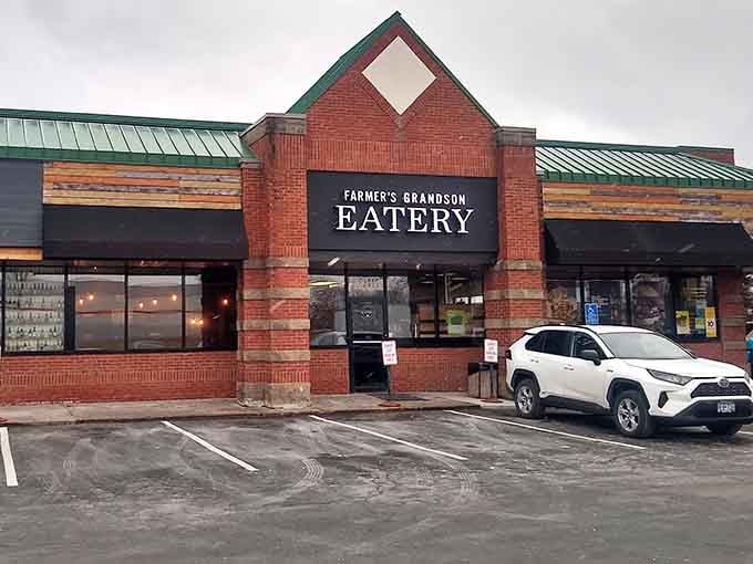 That brick facade and green metal roof hide one of Minnesota's best-kept culinary secrets right next door to the pumps.