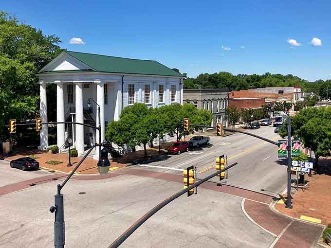 That Greek Revival building with the grand columns isn't just pretty, it's the heart of a downtown worth exploring on foot.