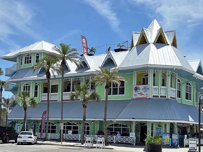 Hurricane Seafood Restaurant's mint-green exterior looks like a beach house designed by someone who really loves geometry and good times.