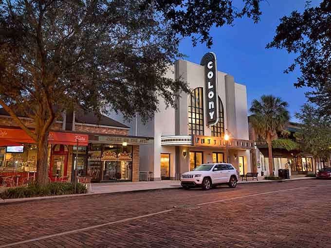 That Art Deco Colony Theatre marquee glowing at dusk proves Winter Park knows how to set a scene.