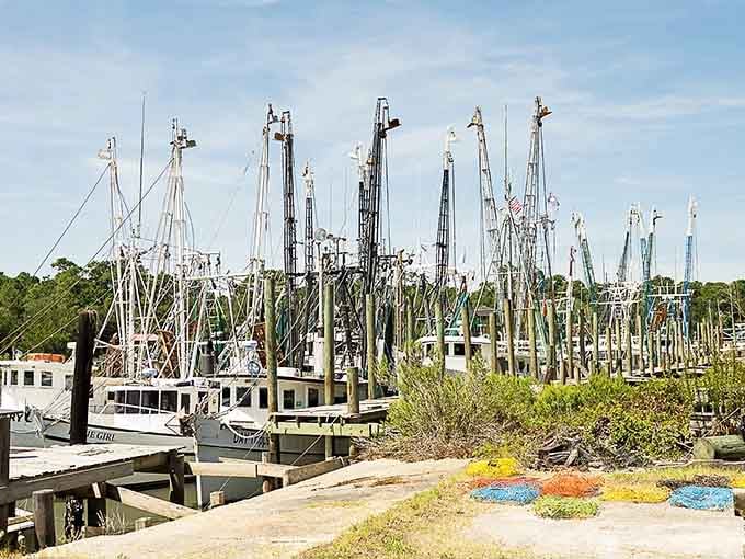 Working boats lined up like soldiers at attention, proving this village's maritime heritage isn't just for show.