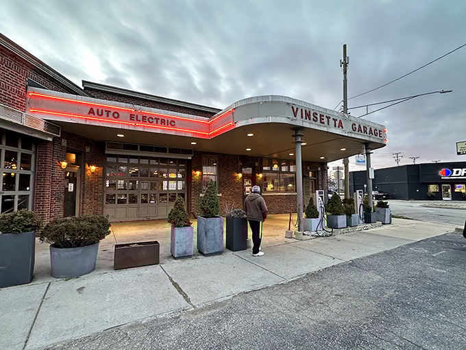 That glowing Art Deco exterior isn't just for show; it's a time machine disguised as dinner plans.