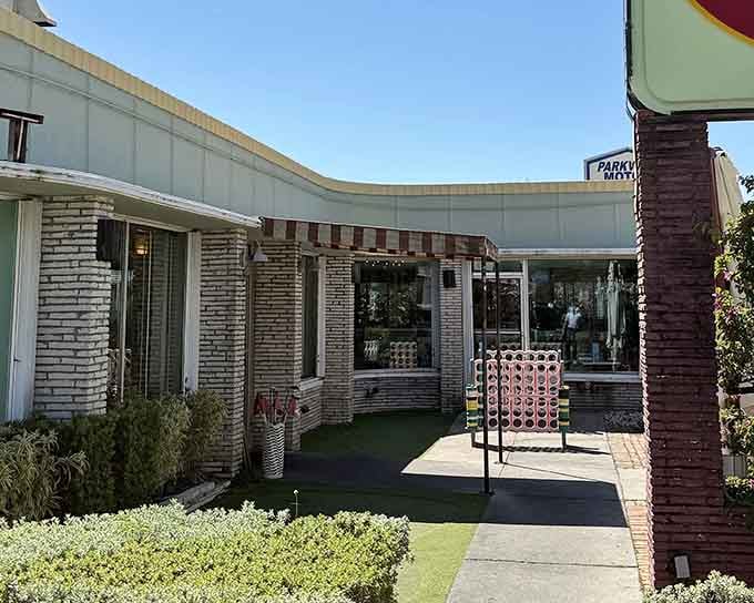 That striped awning isn't just decoration, it's a beacon calling you home to breakfast done right.