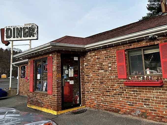 The brick exterior whispers "burgers and fries" while the menu inside shouts "pad thai and curry" beautifully.