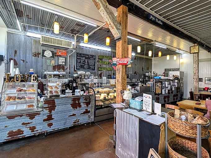 The pastry cases gleaming under those lights hold more temptation than you're probably ready to handle this morning.