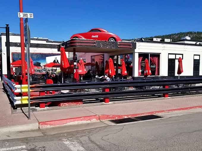 That's not a parking job gone wrong, that's architectural genius with a side of pure Route 66 swagger.