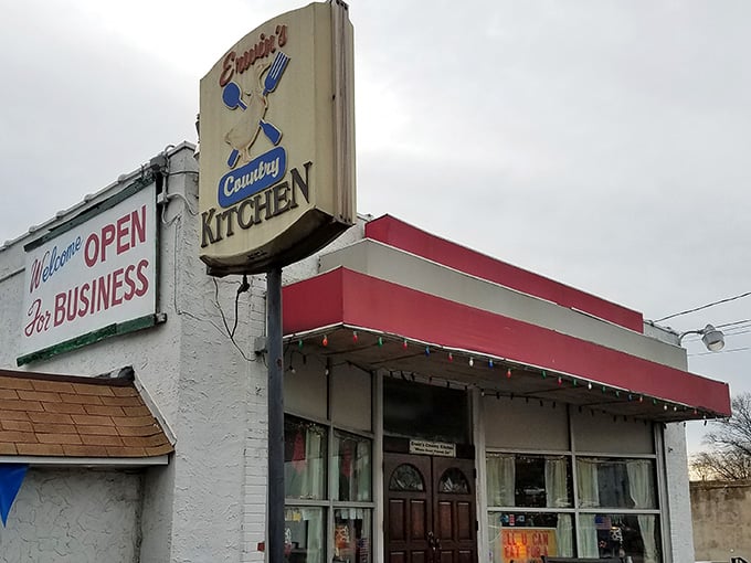 That red awning and those twinkling lights make this place look like it wandered off a Bavarian postcard.