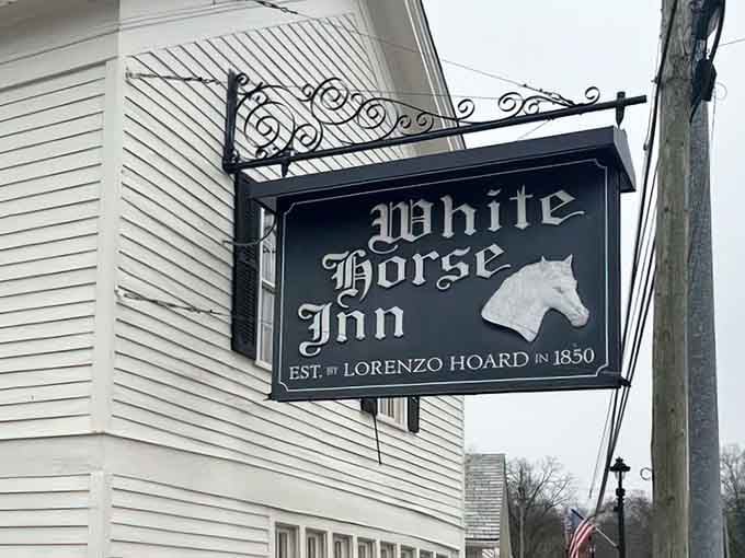The historic sign beckons like a beacon for anyone who appreciates authentic character and exceptional dining.