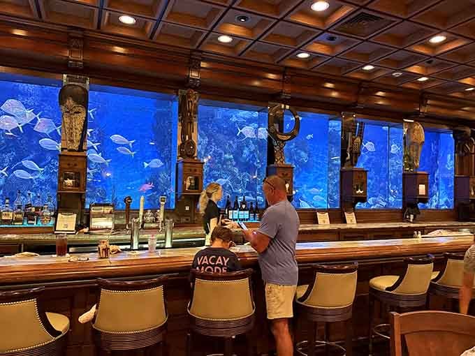 The bar seats offer front-row tickets to the best underwater show in Missouri, cocktails included.