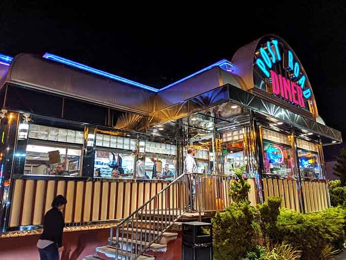 That gleaming chrome exterior isn't just a building, it's a time machine with a neon sign and parking spaces.