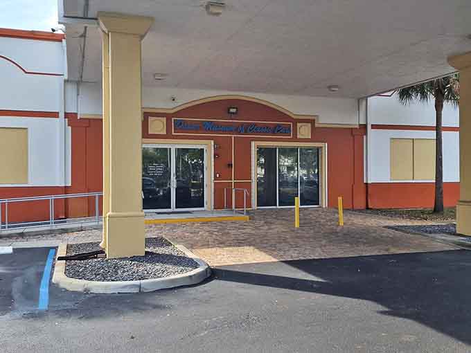 The entrance welcomes you to a time when architecture had personality and cars had even more.