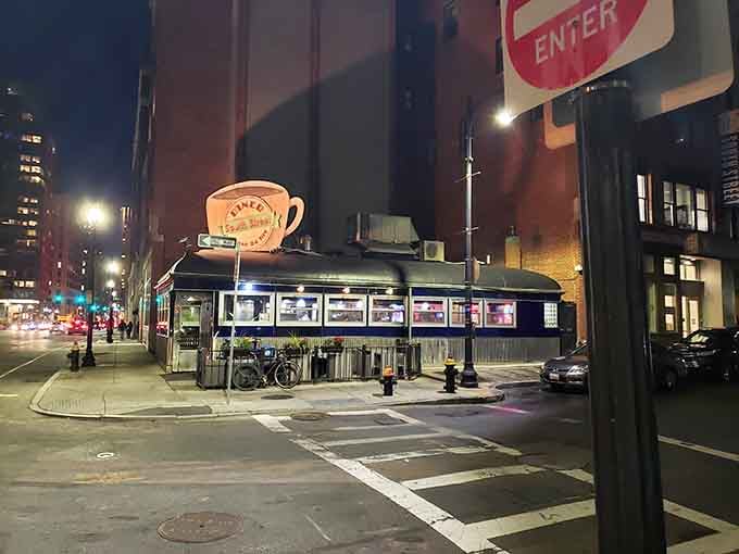 There's something magical about a diner that looks this good under streetlights, proving comfort food never goes out of style.