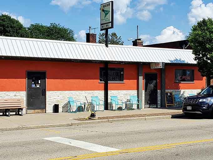 That bright orange exterior isn't shy about announcing itself, like a friendly beacon calling bowlers home.