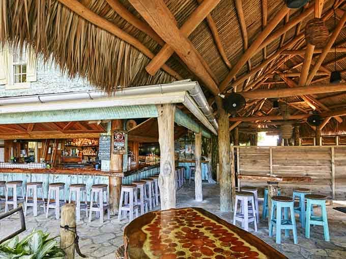 Thatched roofs and weathered wood beams create an island atmosphere so authentic, you'll forget you drove here.