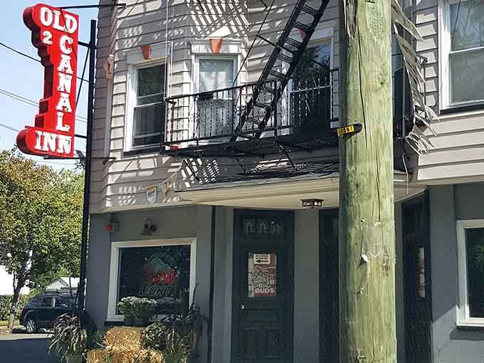 That classic New Jersey corner building charm with fire escapes that have seen decades of neighborhood stories unfold.