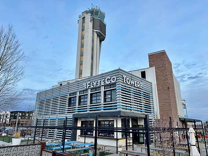 That iconic tower isn't just for show; it's your dinner destination with serious Denver history baked in.