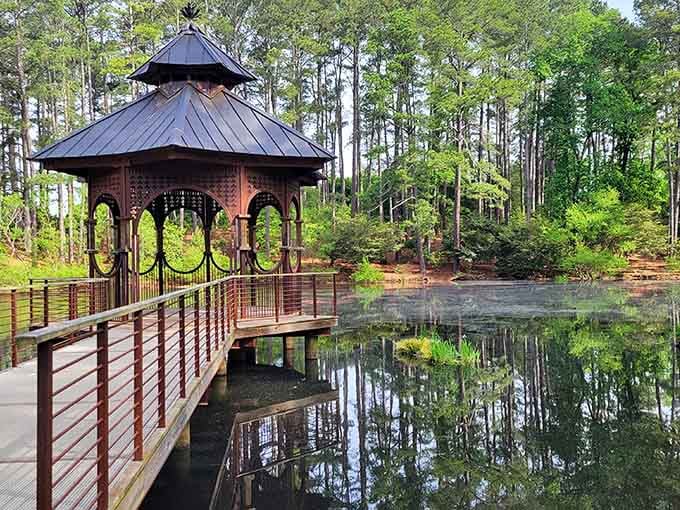 This peaceful gazebo overlooking the pond is where stress goes to die and serenity comes to thrive beautifully.