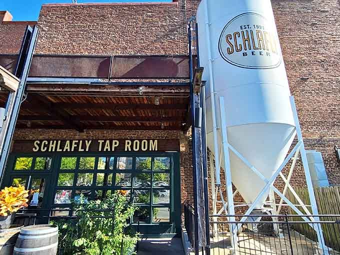 That brick facade and those big windows aren't just architecture; they're a promise of great beer waiting inside.