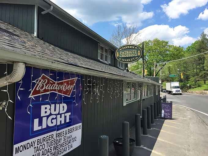 That green exterior and welcoming sign practically beg you to pull over and stay awhile.
