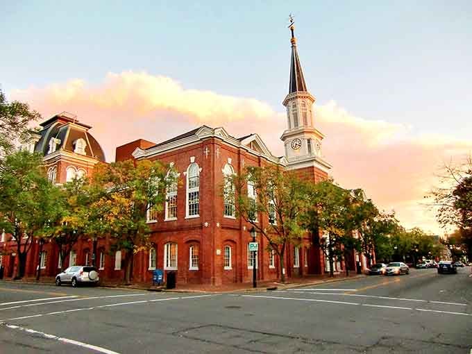 That brick clock tower isn't just for show; it's been keeping Alexandria punctual since horse-drawn carriages ruled these streets.