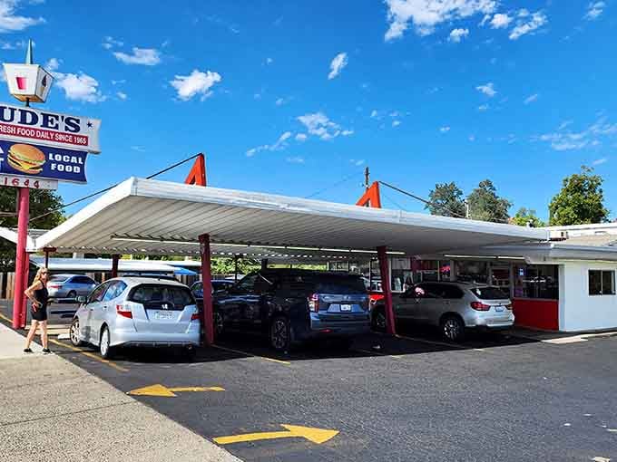 When cars line up like this under a retro awning, you know something magical is happening inside those red walls.