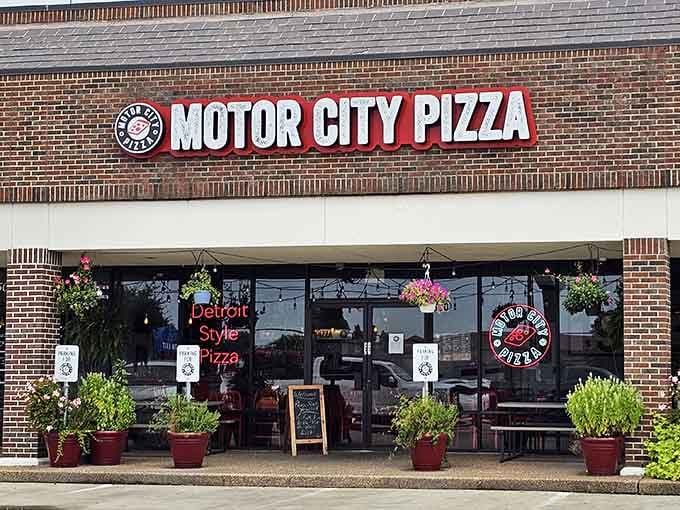 That brick facade and bold signage announce Detroit-style pizza has officially landed in Texas, y'all.