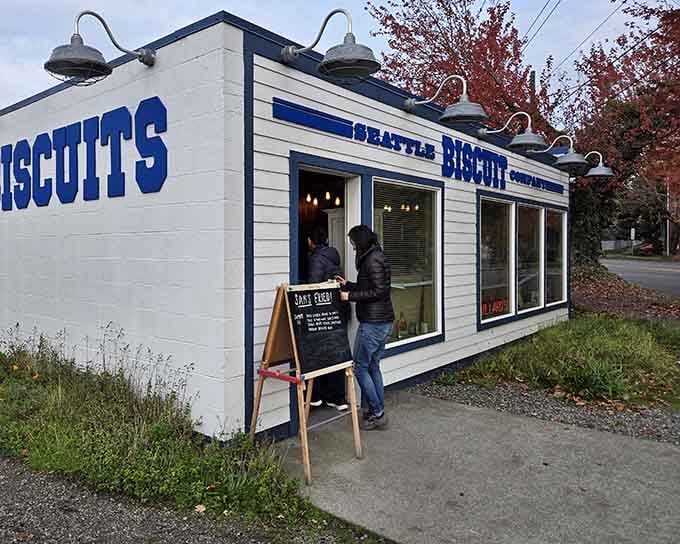 That blue and white exterior isn't fancy, but it's calling your name louder than a Southern grandmother at Sunday dinner.