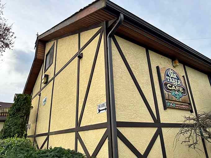 That yellow exterior with timber framing looks like a Bavarian cottage decided to serve pancakes in Washington.