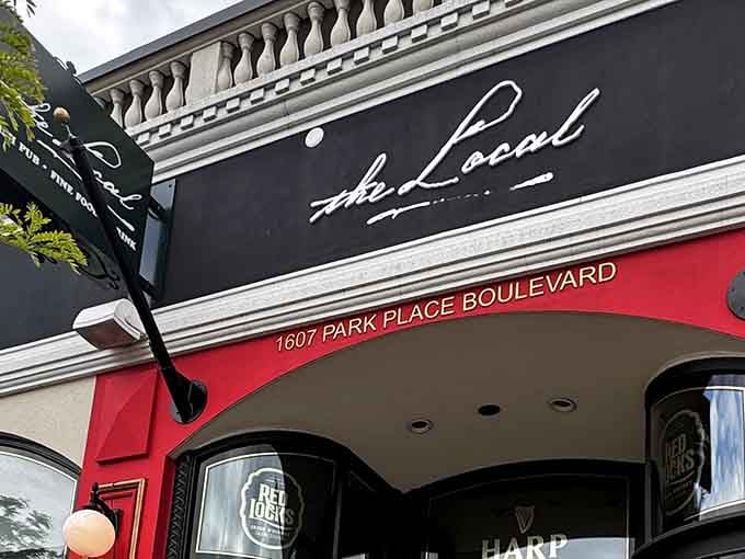 That classic red awning and elegant script signage practically whisper "come in, you're going to love this place."
