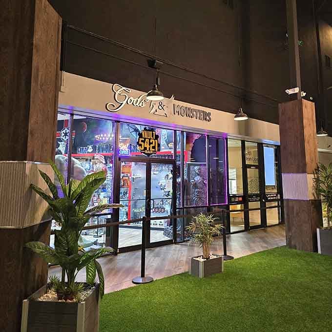 Gods & Monsters storefront welcomes you with neon charm before the real adventure begins inside.