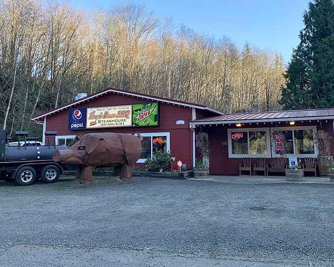 That giant pig sculpture isn't just yard art, it's a delicious promise made in metal and rust.