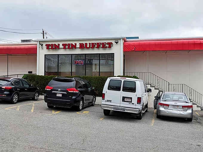That red awning is like a beacon calling all who understand that the best restaurants never need fancy exteriors.