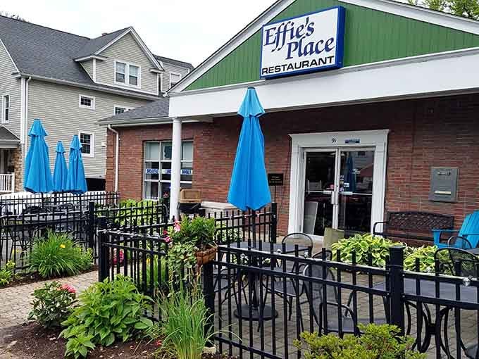 Those blue umbrellas aren't just providing shade, they're creating a breakfast sanctuary where pancakes meet fresh air.