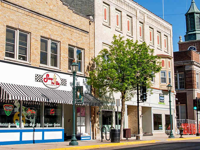 That checkered awning and vintage signage aren't just decoration—they're a promise of what's waiting inside for you.