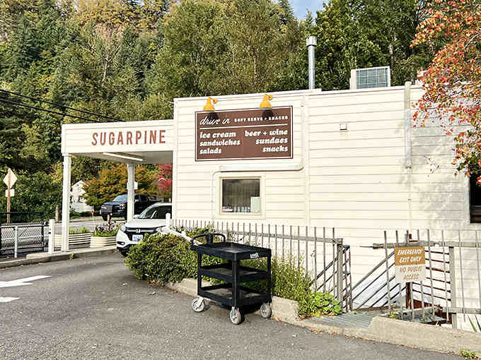 The vintage signage and autumn foliage create a scene so charming, you'll want to move in next door.